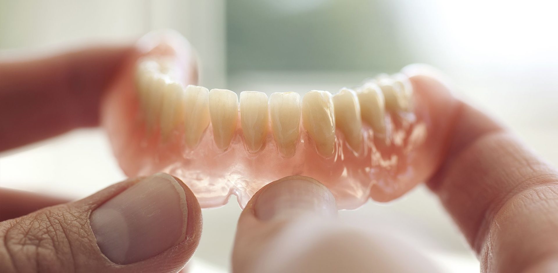 Removable vs. Fixed Dentures: Pros and Cons